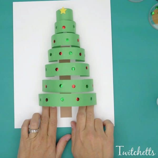 How to make a fun 3D paper Christmas tree craft with construction paper ...