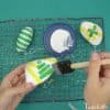 How to make Tissue Paper Christmas Rocks with kids - Twitchetts