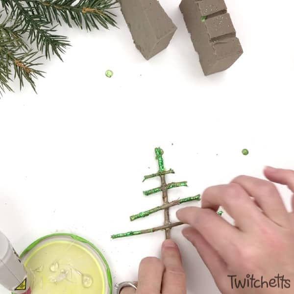 How to make sparkly tree-shaped Christmas ornaments using sticks