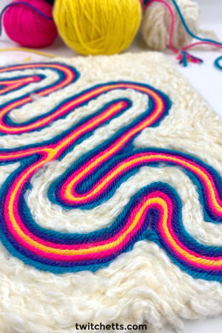 How to make DIY Yarn Canvas Art for unique wall art - Twitchetts